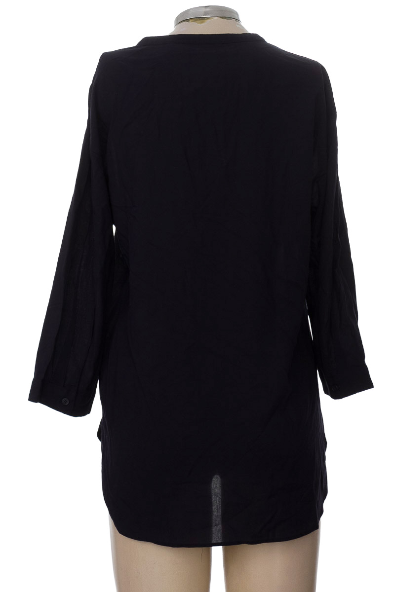 Blusa color Azul - UNIQLO | Closeando