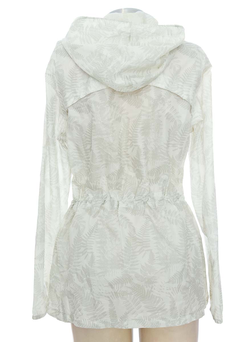 Ropa Deportiva / Salida de Baño color Beige - Quechua | Closeando