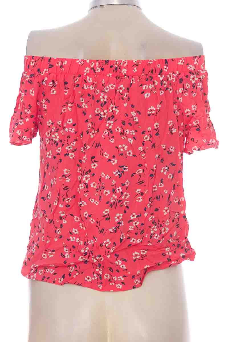 Top / Camiseta color Rosado - People talla XS de Segunda Mano | Closeando