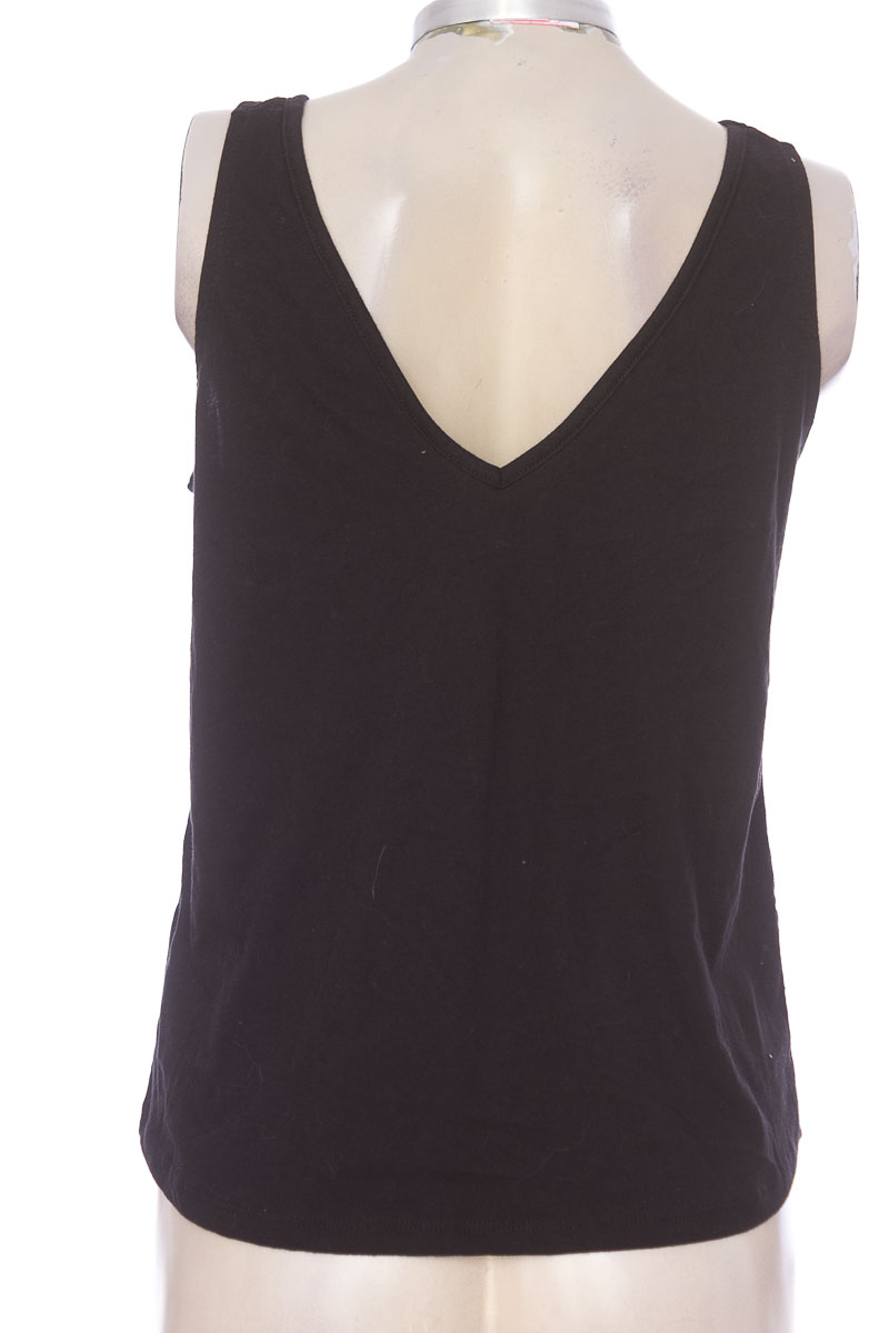 Top / Camiseta color Negro - Leonisa talla S como nuevo | Closeando
