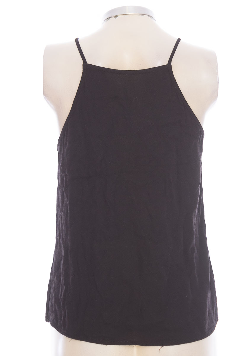 Top / Camiseta color Negro - Leonisa | Closeando