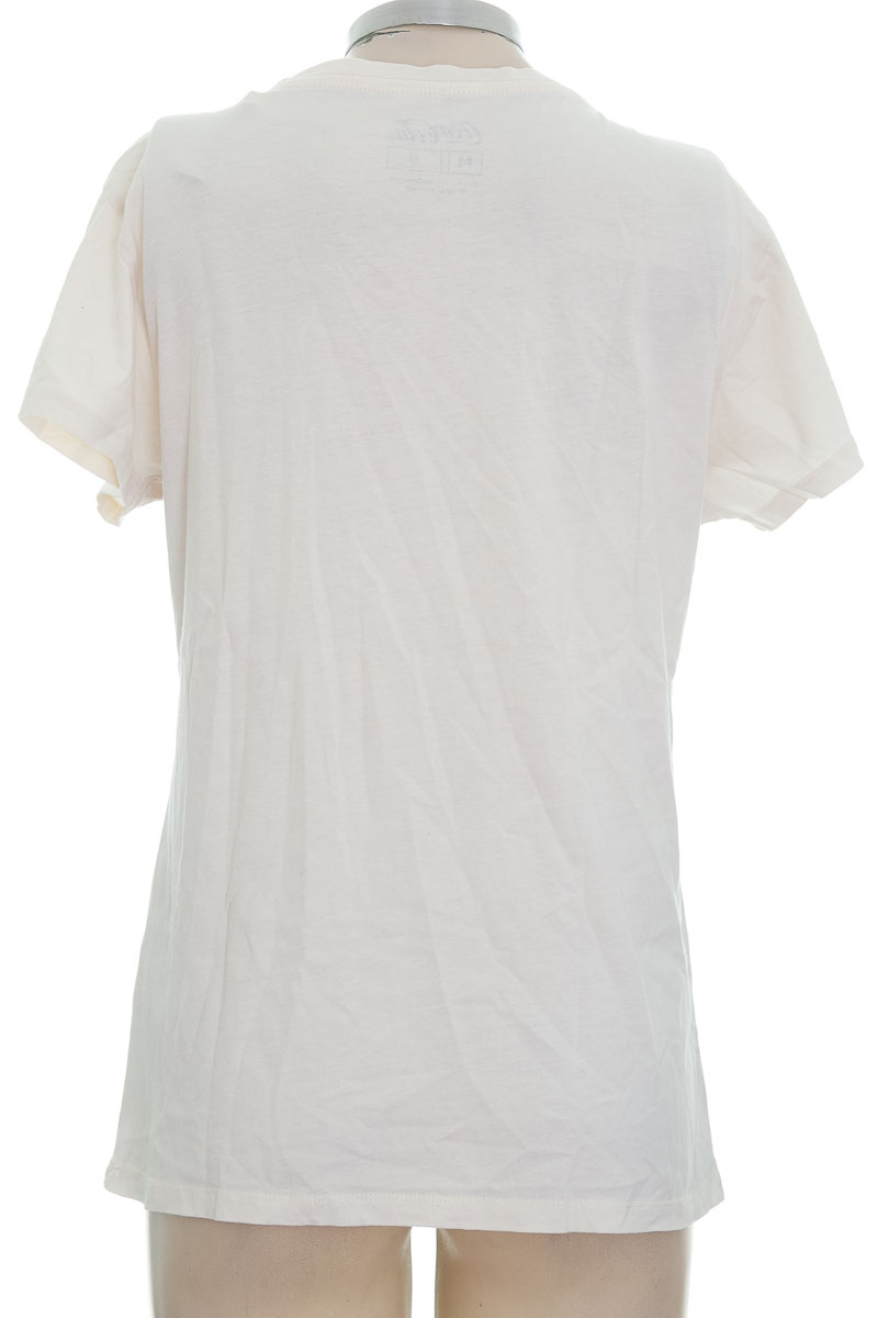 Top / Camiseta color Beige - Coca cola | Closeando