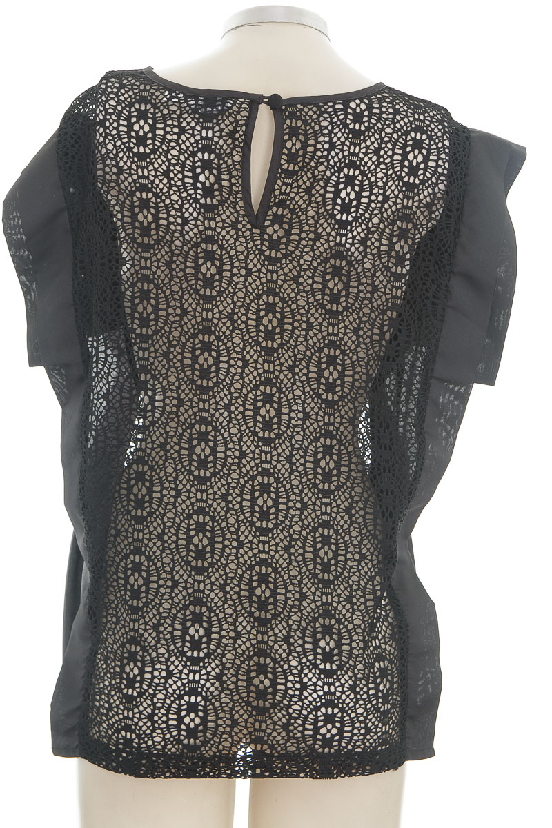 Blusa color Negro - Virgen del Valle talla M de Segunda Mano | Closeando