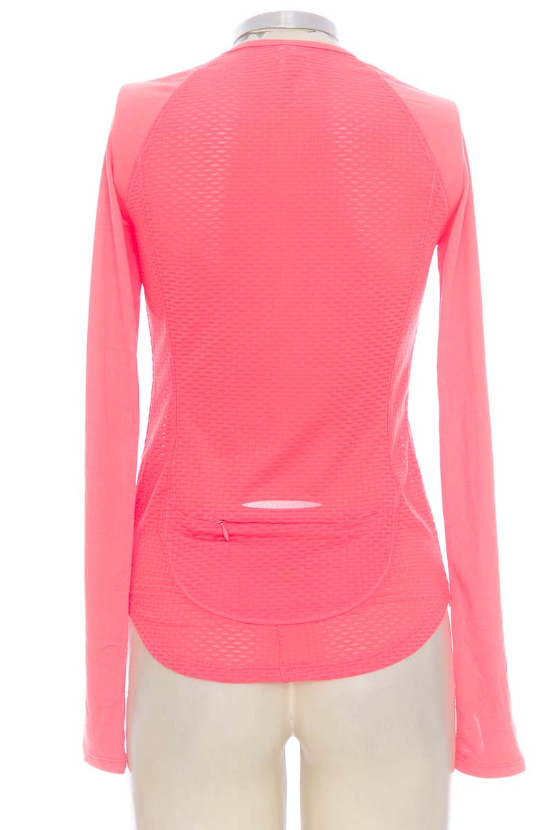 Ropa Deportiva / Salida de Baño color Salmón - Under Armour | Closeando
