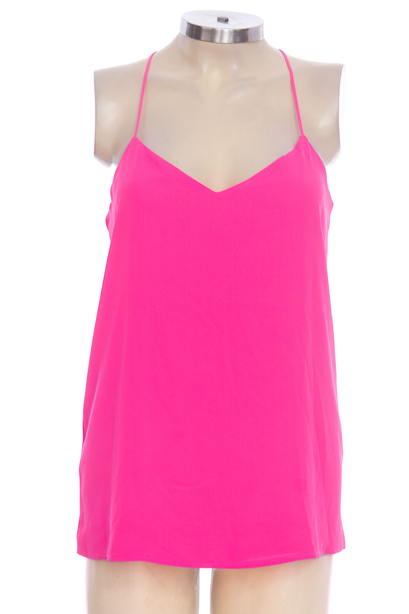 Top / Camiseta color Rosado - Closeando talla M de Segunda Mano | Closeando