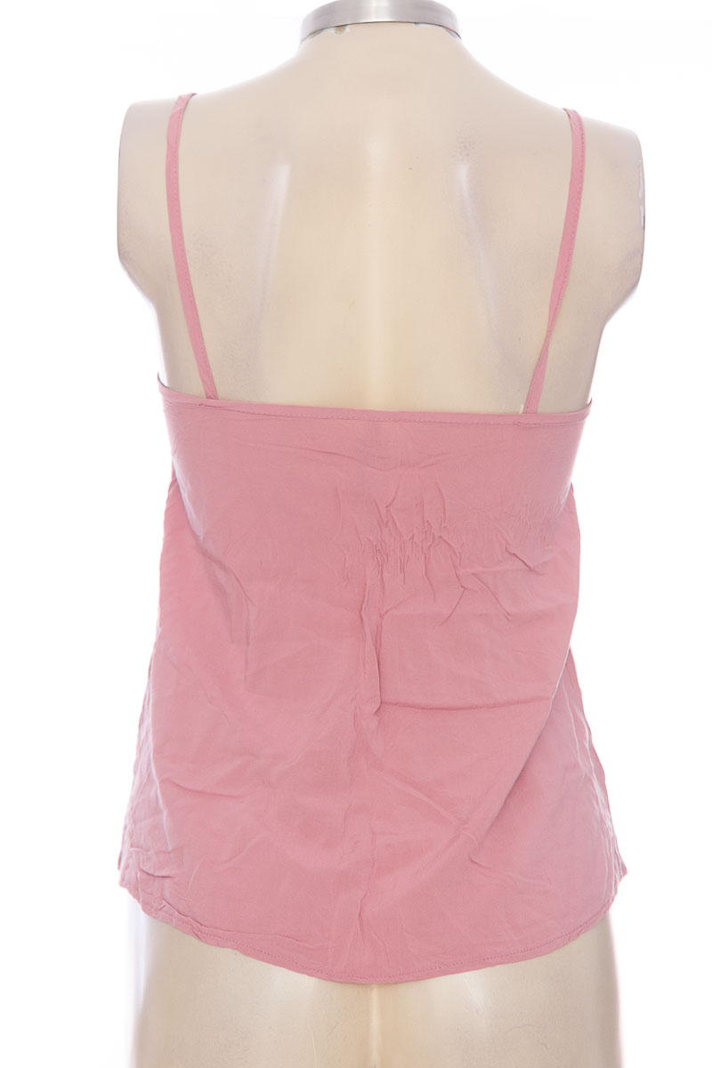 Top / Camiseta color Rosado - Carmel talla S de Segunda Mano | Closeando