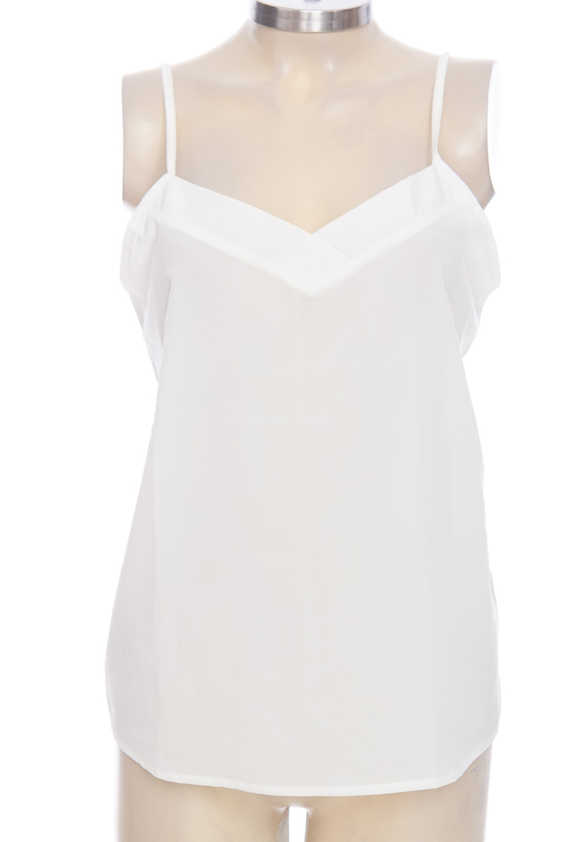 Top / Camiseta color Blanco - Leonisa | Closeando