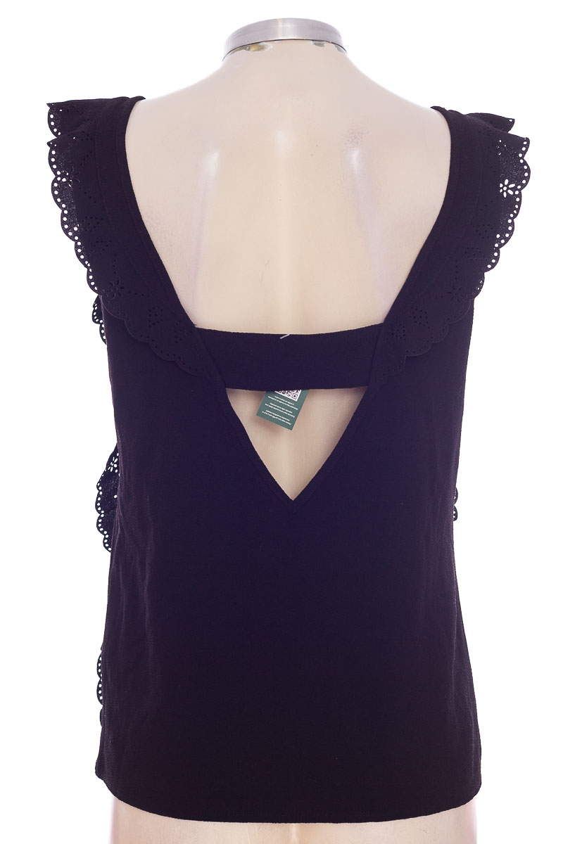 Top / Camiseta color Negro - NAF NAF | Closeando