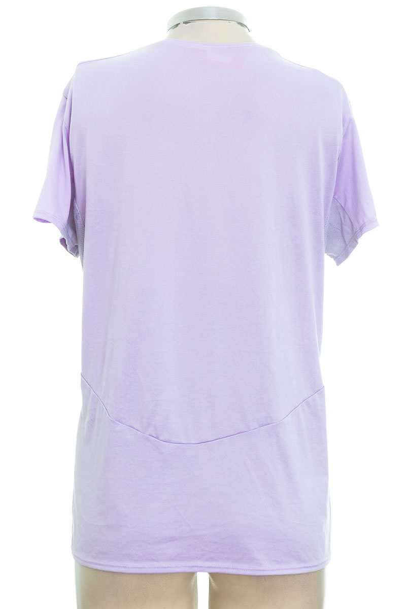 Ropa Deportiva / Salida de Baño color Morado - Quechua | Closeando