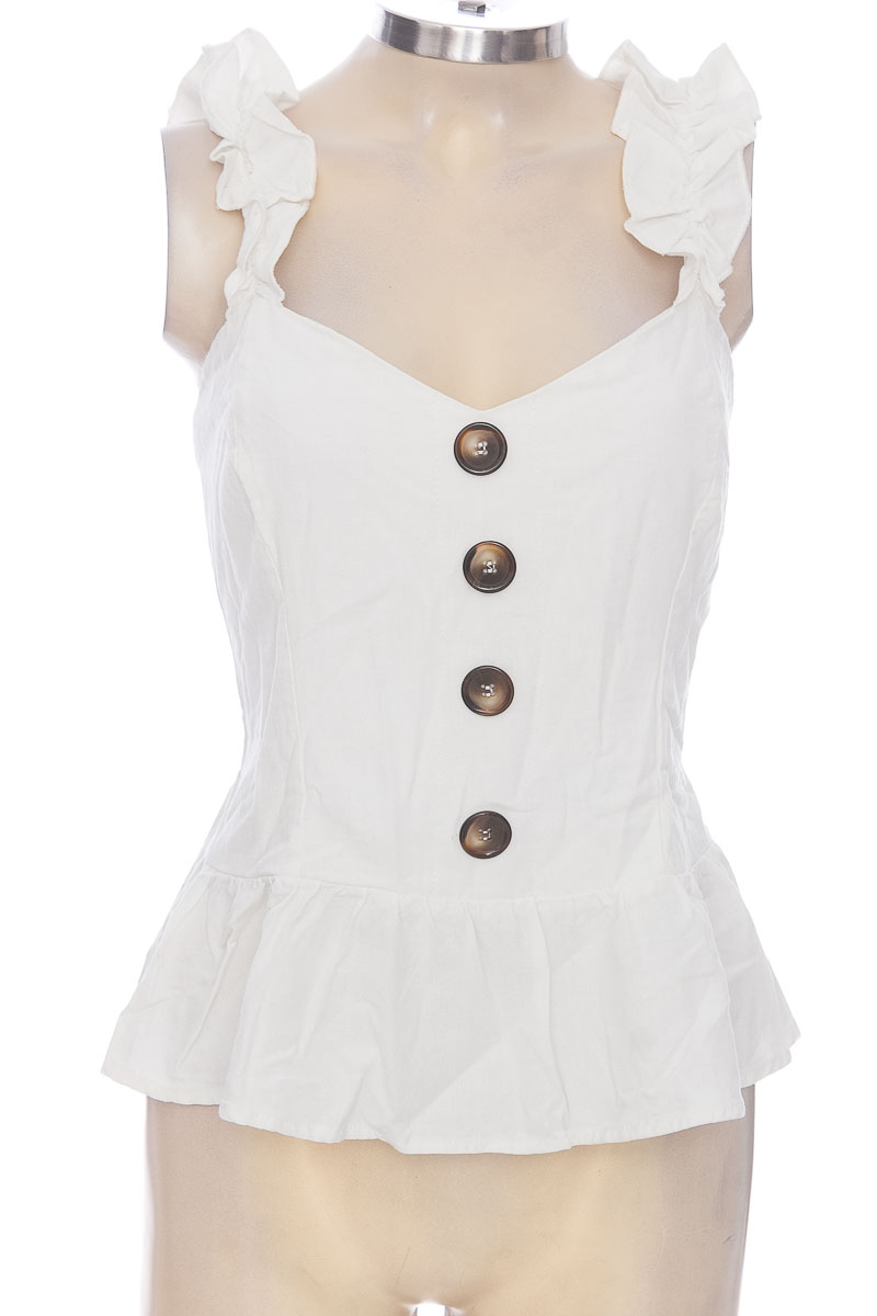 Top / Camiseta color Blanco - Colors | Closeando